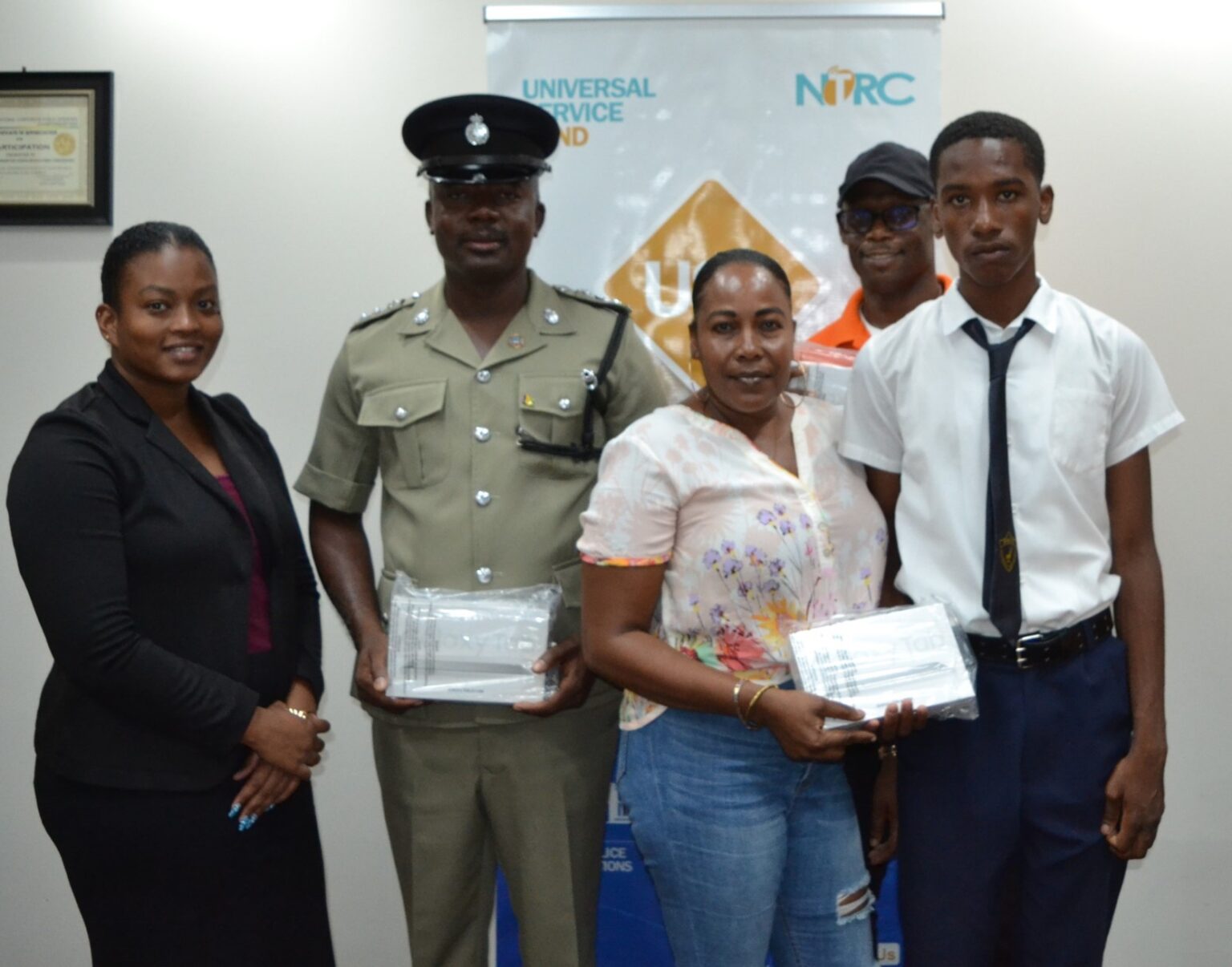 NTRC donates tablets to RSVGPF Chateaubelair Police Youth Club ...